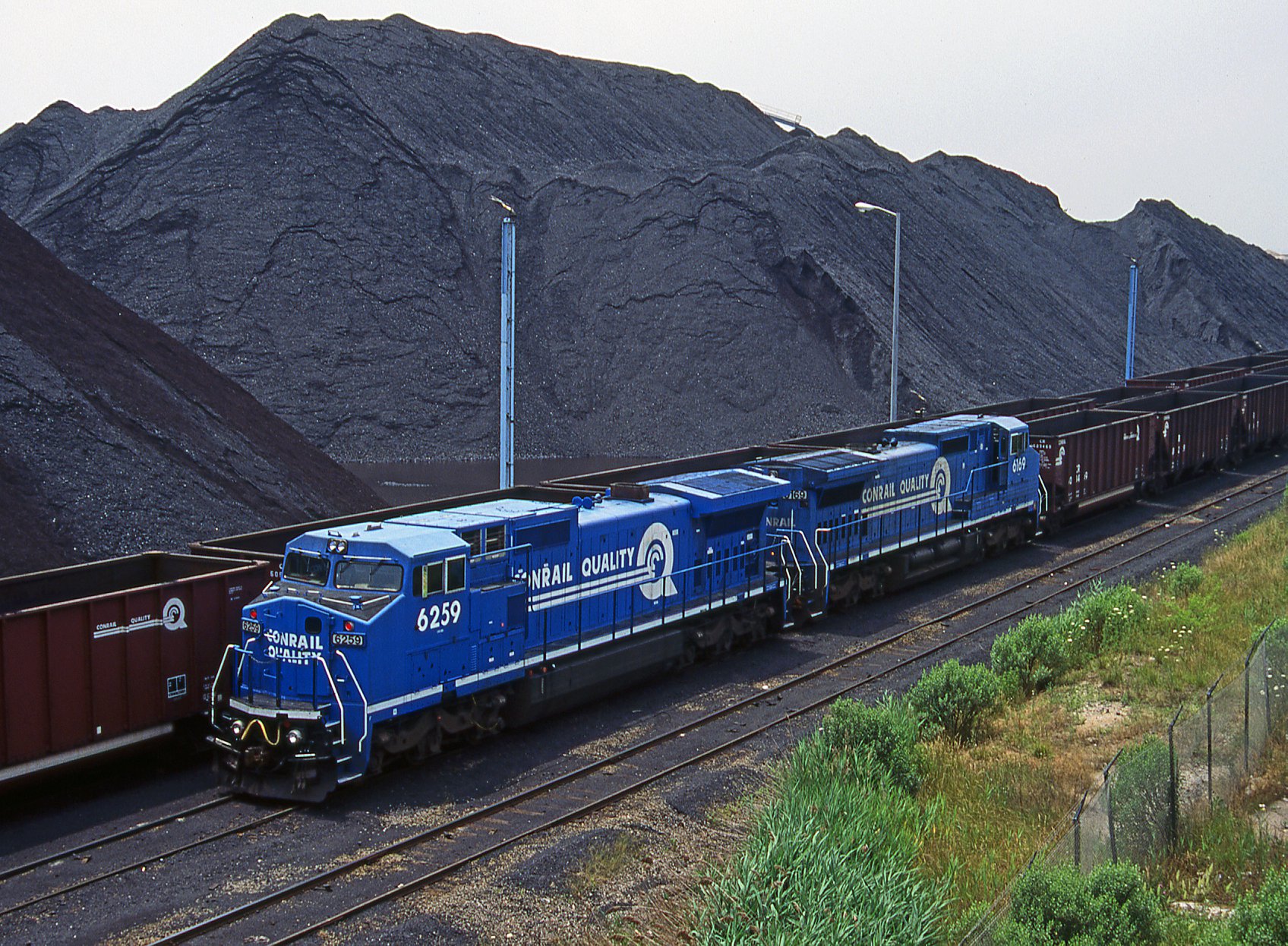 CR 6259 & 6169 are unloading on the loop at the Consol Coal Company in Baltimore, MD. 6/95 ...